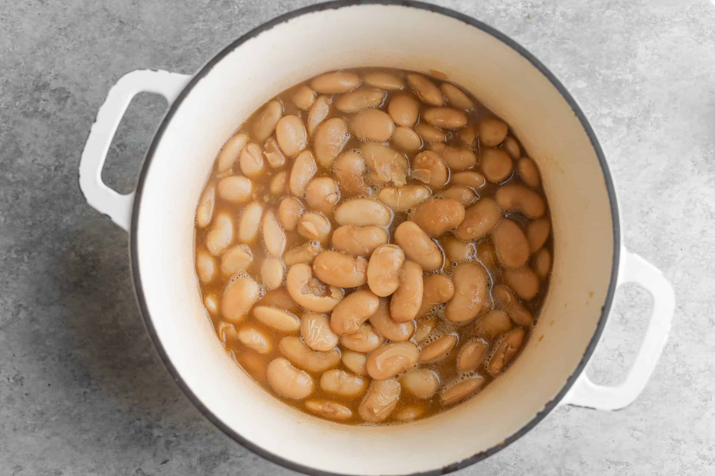 Brothy Gigante Beans with Spinach - Delish Knowledge
