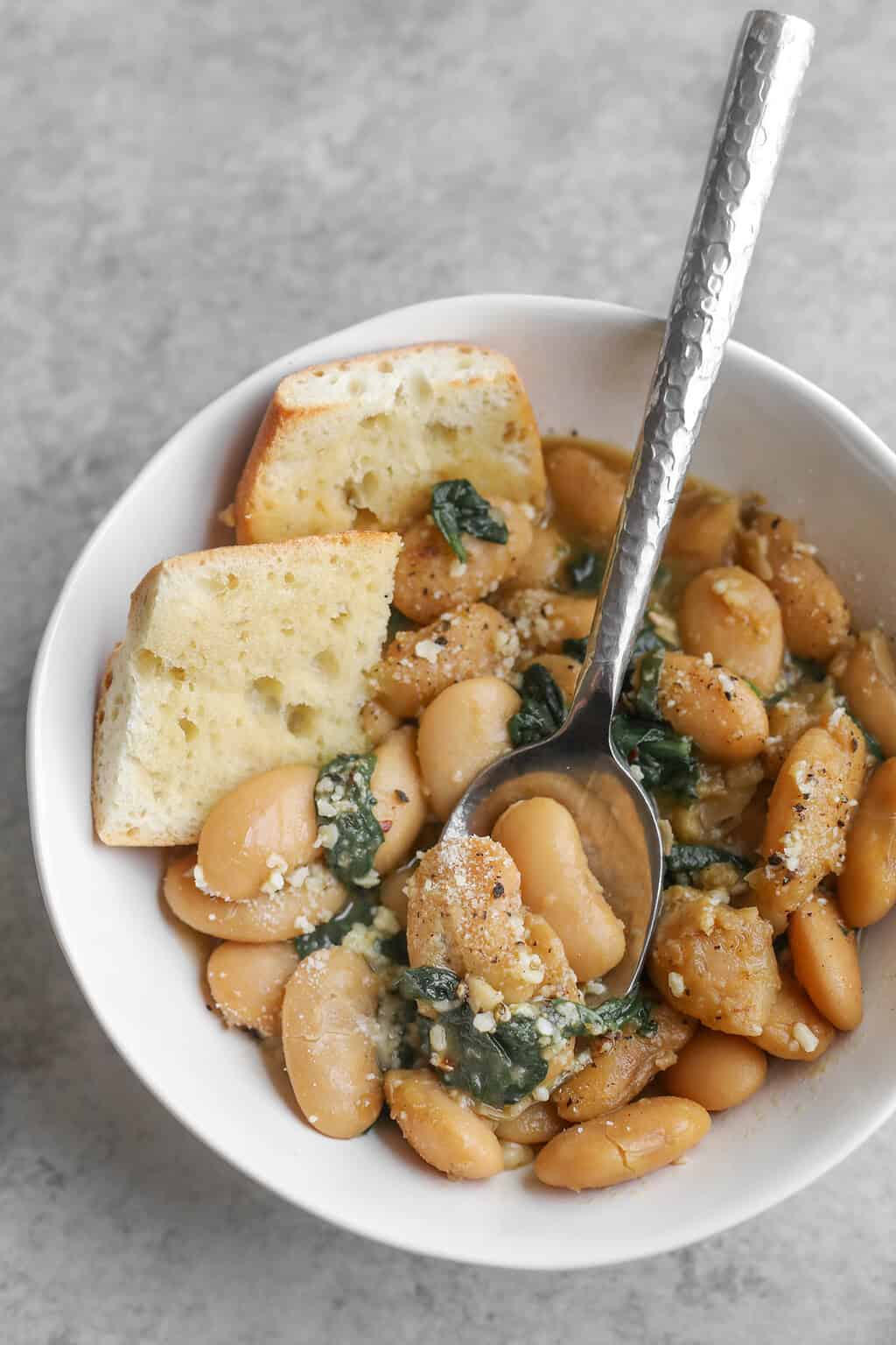 Brothy Gigante Beans with Spinach - Delish Knowledge