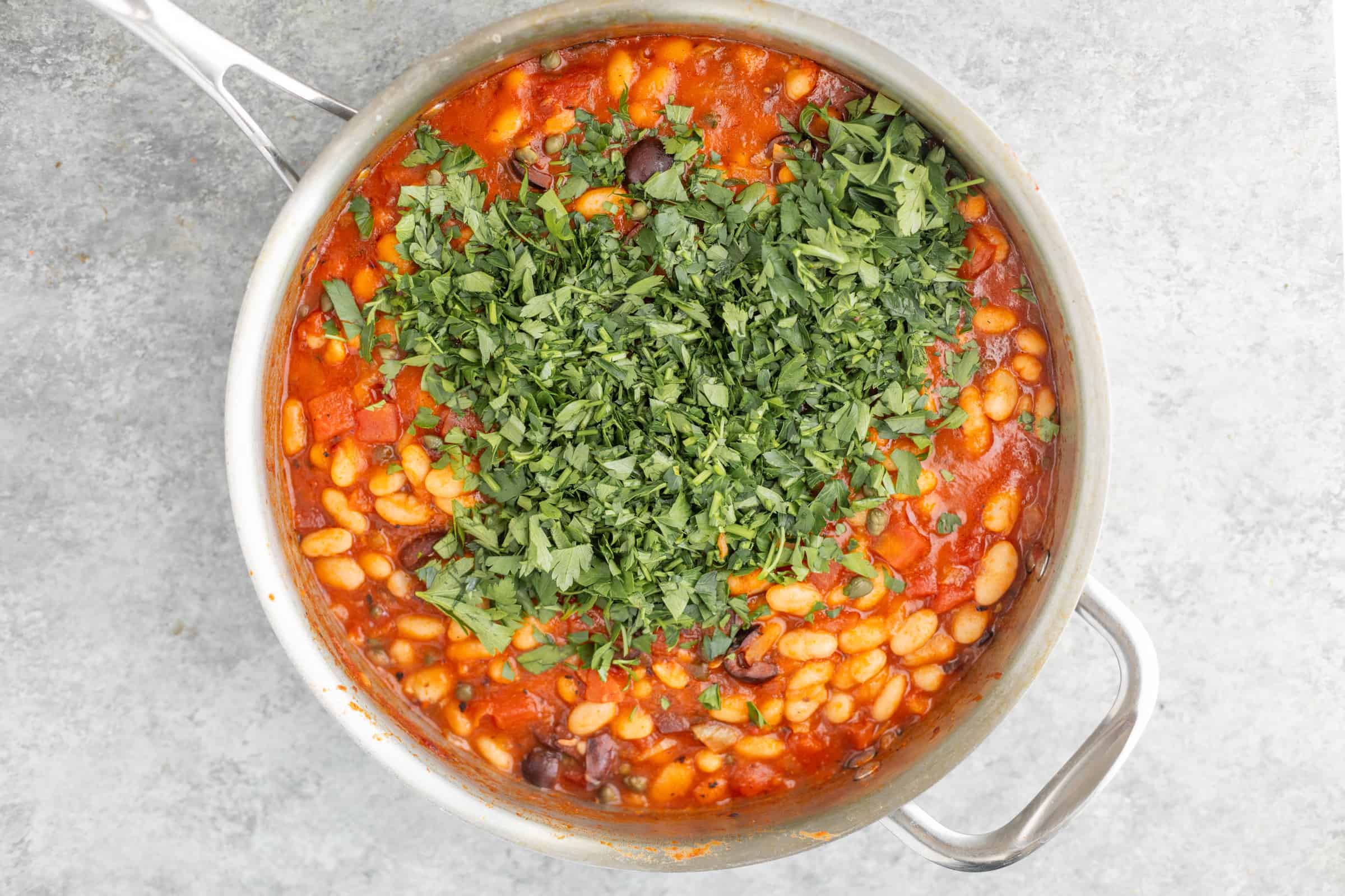 Puttanesca Beans with Garlic Bread - Delish Knowledge