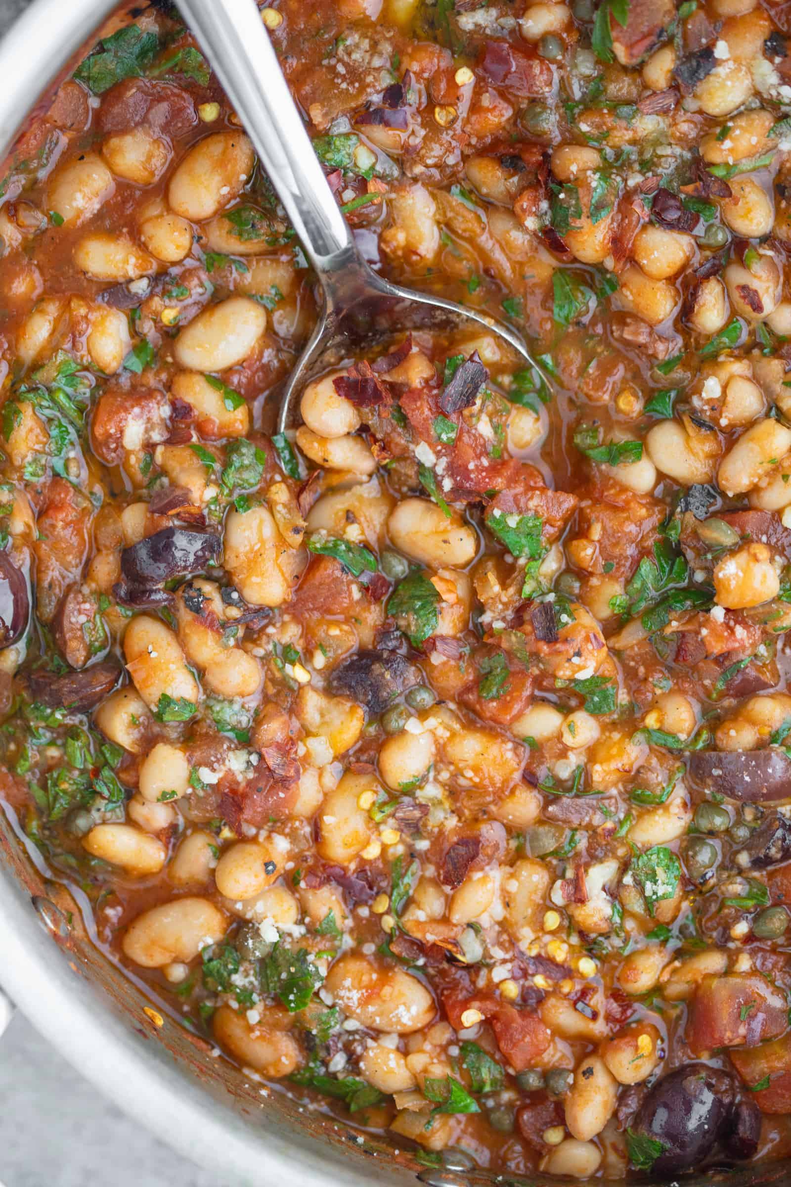 Puttanesca Beans with Garlic Bread - Delish Knowledge